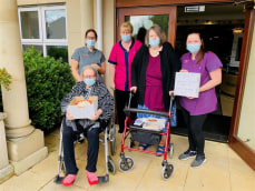 Nappies and Paddies Day Nursery bake a cake for Winifred Dell