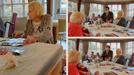 Finishing the Christmas decorating at Devizes care home