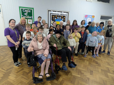 Kids delight Care South residents by serving up an afternoon of fun